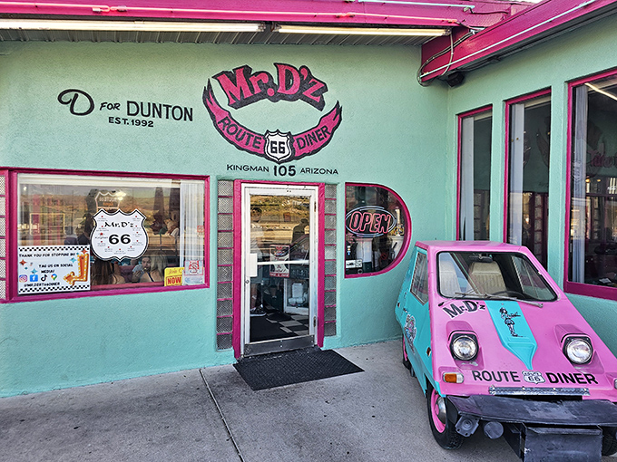 The mint-green facade with its custom-painted mini car announces "you're not in 2023 anymore" before you even reach for the door.