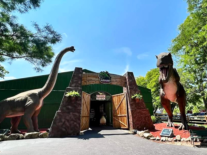 The gateway to Jurassic Gardens is marked by towering dinosaur displays that instantly pull you into a prehistoric world.