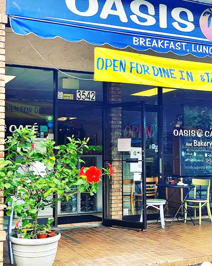 Potted flowers welcome visitors to this breakfast sanctuary where the neon "OPEN" sign promises more than just food &ndash; it promises an experience.