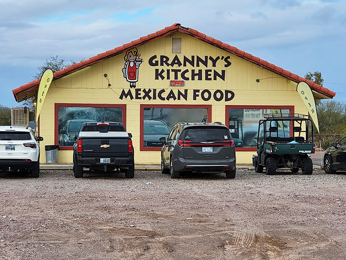 From the outside, you might drive past without a second glance – but locals know this parking lot fills up fast when hunger strikes. Those mountains in the background are just a bonus view.