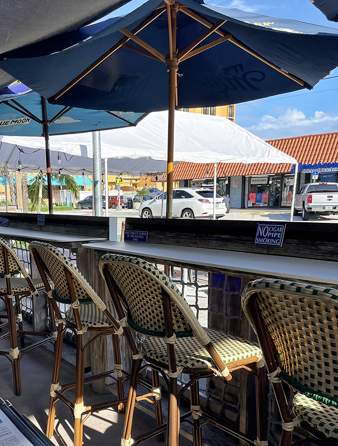 The outdoor seating area offers prime people-watching with your stone crabs &ndash; Florida dining as it should be, casual and breezy.
