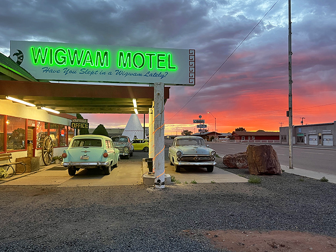 As night falls, the Wigwam's neon sign glows like a beacon, guiding modern explorers to this perfectly preserved piece of Route 66 history.