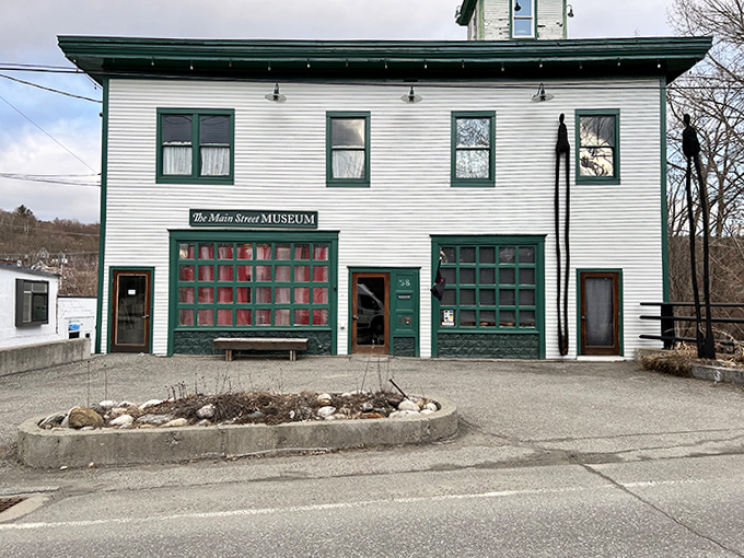 The museum's distinctive green-trimmed façade welcomes visitors to step out of the everyday world and into a realm of wonder.