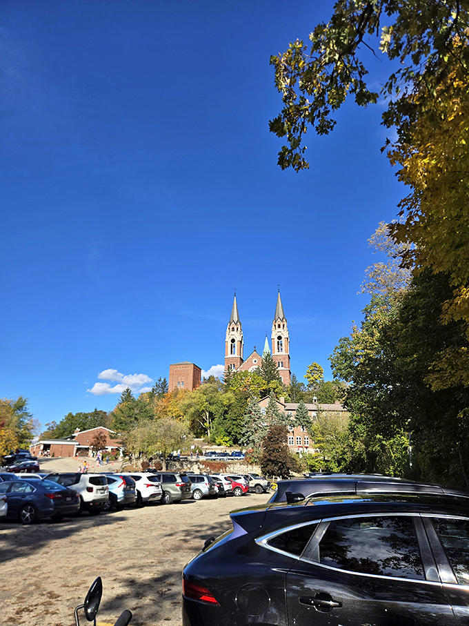 Even the parking area offers stunning views, with the basilica rising dramatically against Wisconsin's famously blue autumn skies.