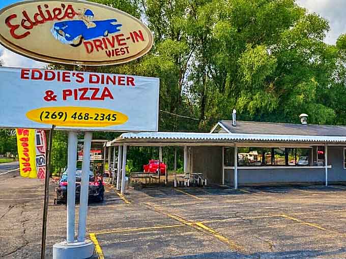 The weathered garden sign tells just enough of the story, leaving the rest to be discovered by curious visitors.