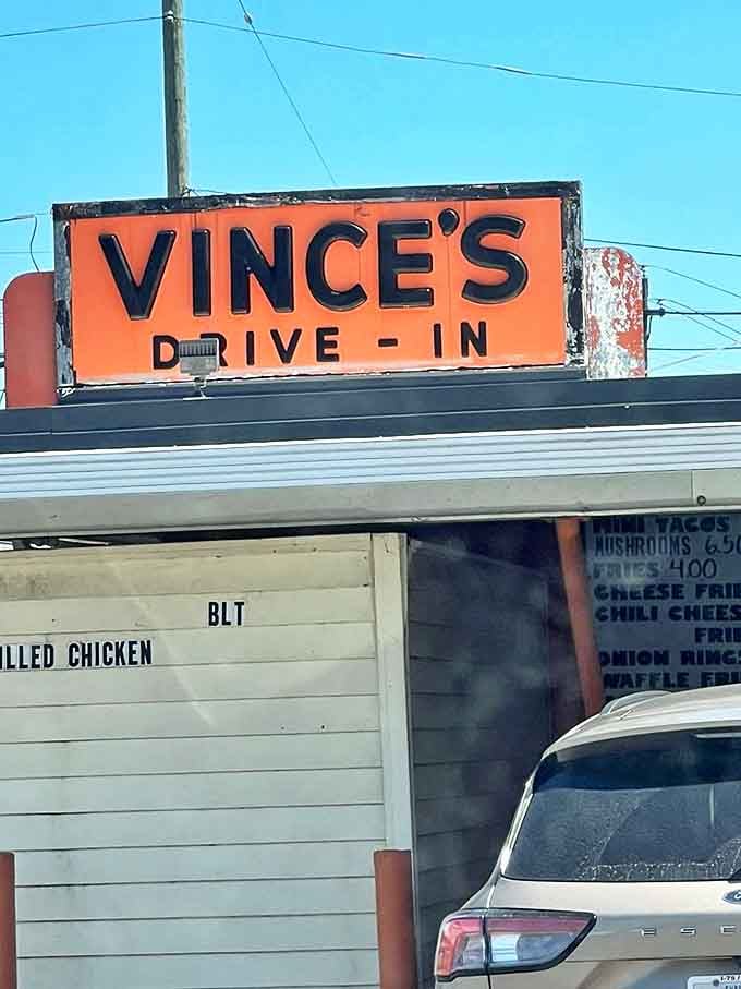 That bright orange "Vince's Drive-In" sign isn't just identification &ndash; it's a landmark, a meeting place, and for many Michigan locals, the signal that they're finally home.