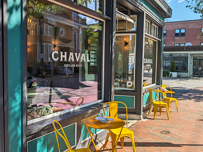 Sunshine plays across Chaval's welcoming fa&ccedil;ade, with cheerful yellow chairs inviting passersby to pause and stay awhile. The perfect spot to watch the world go by.