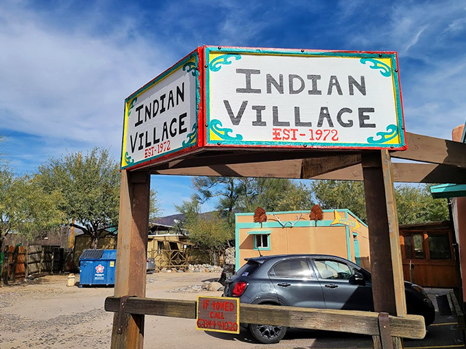 The hand-painted entrance sign welcomes hungry visitors, promising authentic Southwestern cuisine that's stood the test of time in Cave Creek.