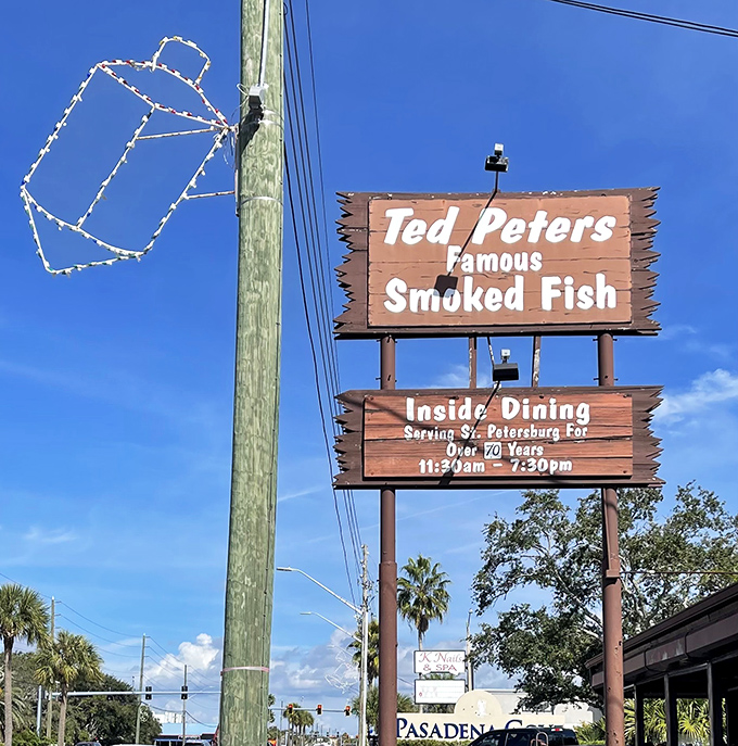 Like a beacon to smoked fish aficionados, this weathered sign has guided hungry pilgrims to flavor paradise for over seven decades.