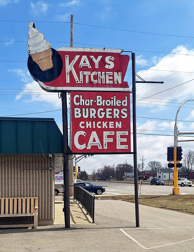 The vintage-style sign with its ice cream cone logo has become a beacon for hungry travelers, promising honest food without pretension.