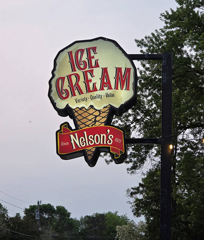 As evening approaches, Nelson's sign glows like a beacon of sweetness, guiding ice cream lovers to their happy place until season's end.