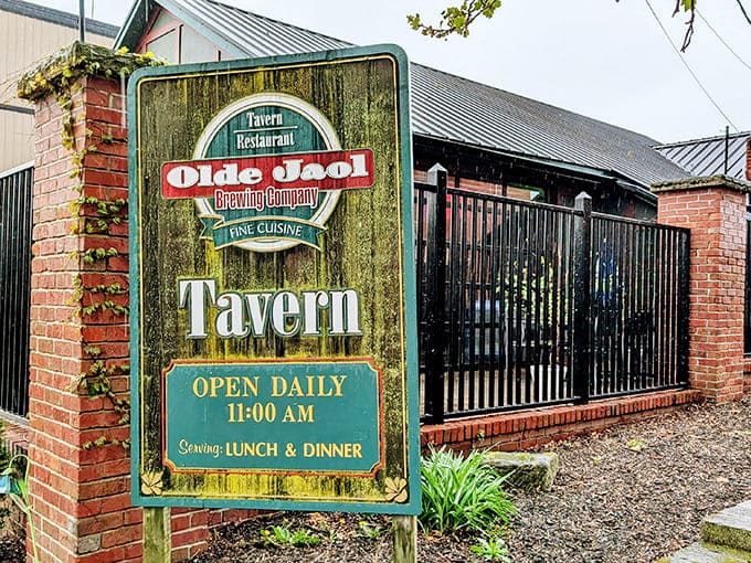 The tavern sign welcomes hungry visitors, promising fine cuisine in a setting where "doing time" now means enjoying a leisurely meal.