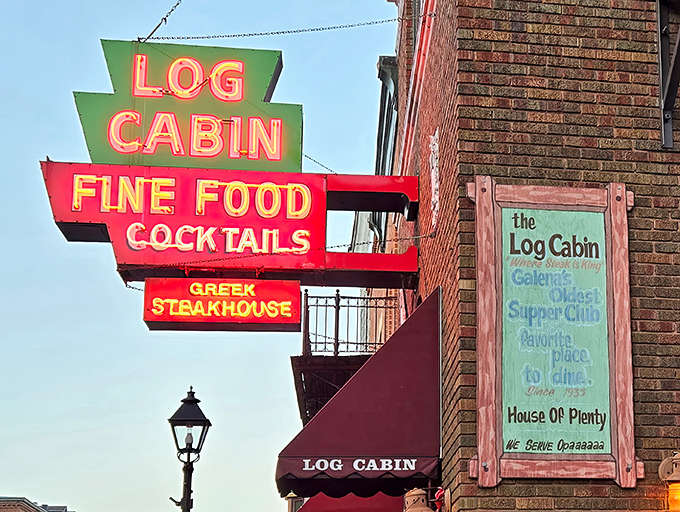The Log Cabin's vintage sign promises "Fine Food" and "Cocktails" – two simple promises that have kept diners returning to this Galena institution for generations.