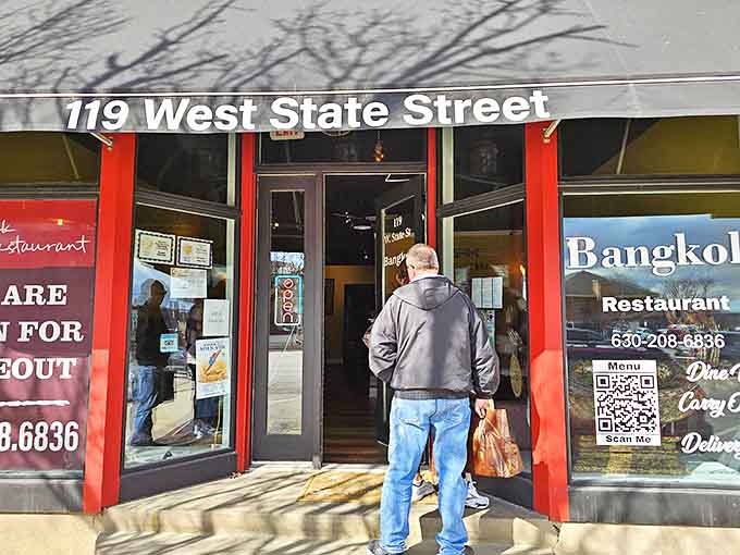 The welcoming entrance to Candlelight Inn beckons hungry visitors into a world where chicken tenders are elevated to an art form.