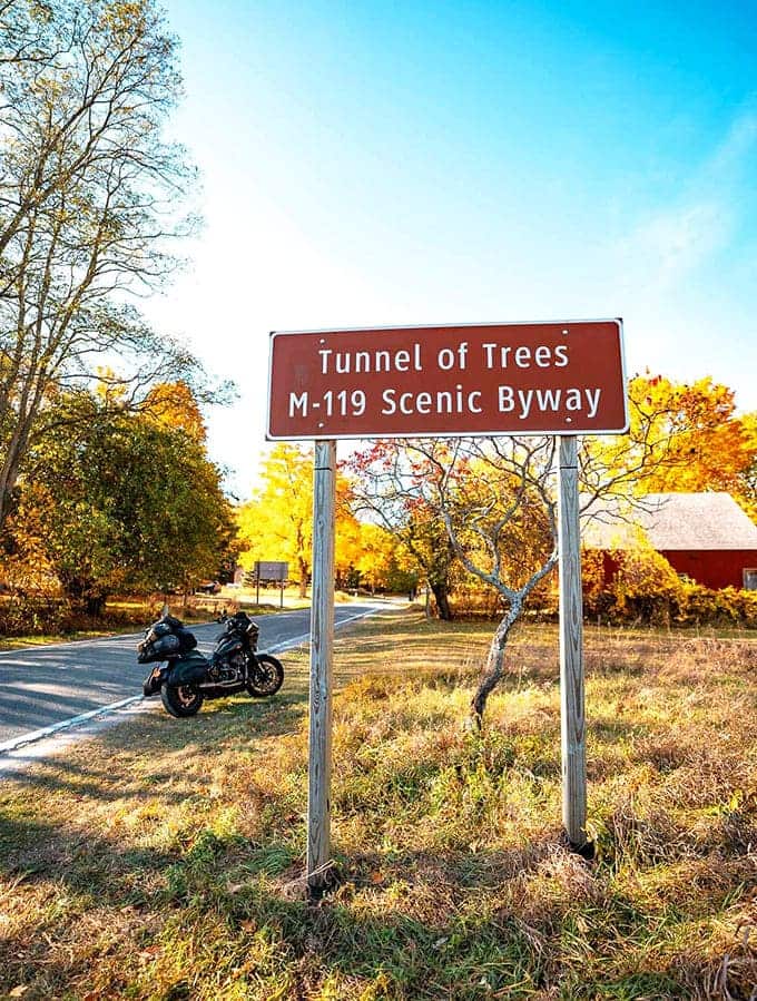 The official welcome: This unassuming blue sign marks the entrance to one of America's most spectacular scenic drives.