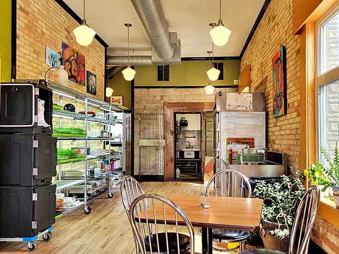 The original bank vault door stands as a silent sentinel to history, now guarding culinary treasures instead of financial ones.