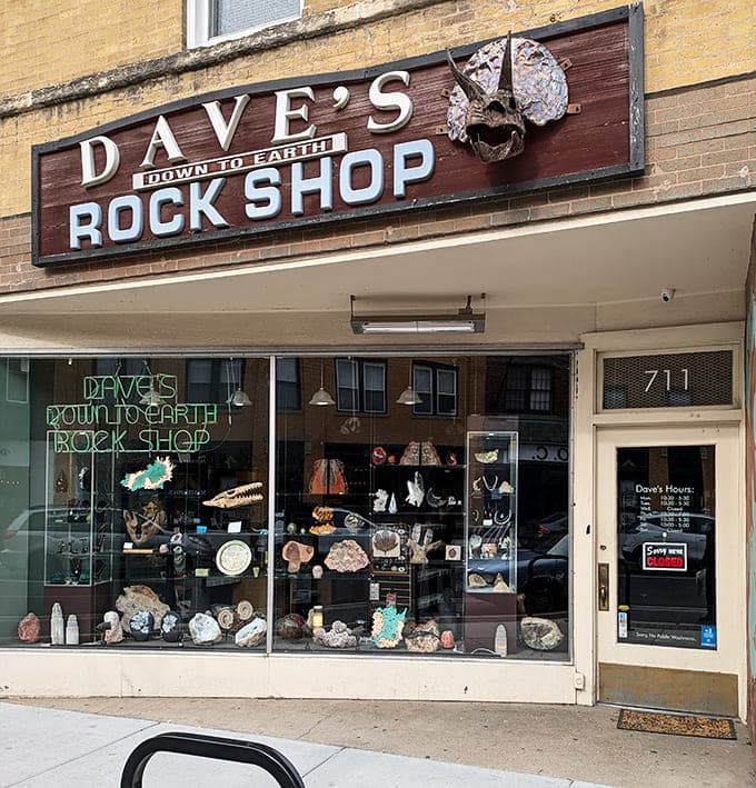 Dave's Down to Earth Rock Shop welcomes visitors with windows full of sparkling crystals and colorful minerals.