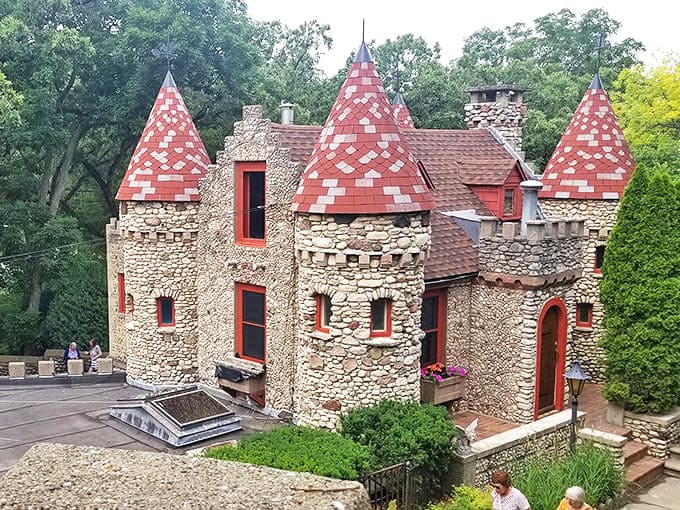 The stone towers and red roofs create a European castle vibe that makes you forget you're in suburban Illinois for a minute.