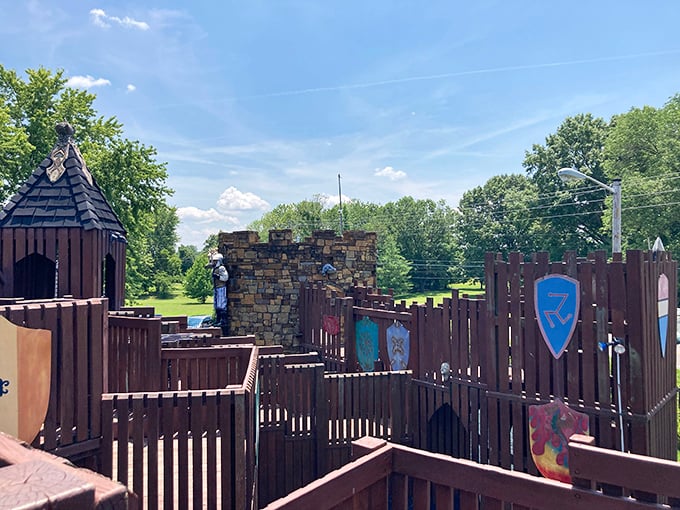 A wooden fortress fit for young knights and princesses, this playground castle features stone walls, wooden towers, and colorful shields &ndash; medieval fun without the dragon danger!