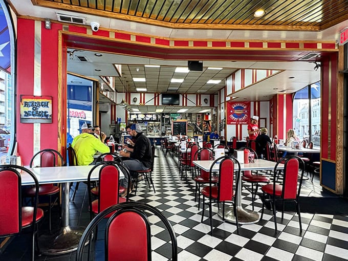 Step inside and travel back in time &ndash; the classic black and white checkered floors, red vinyl seats, and nostalgic decor create the perfect backdrop for culinary magic.