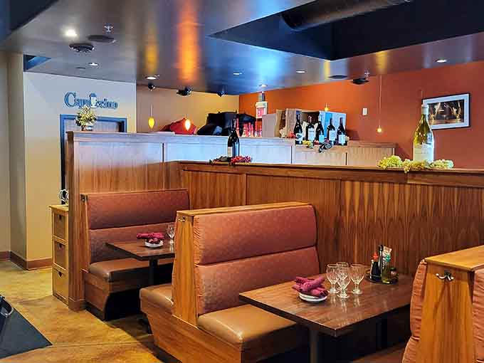 Warm wood tones and cozy booths create the perfect setting for carb-loading without judgment or pretense.