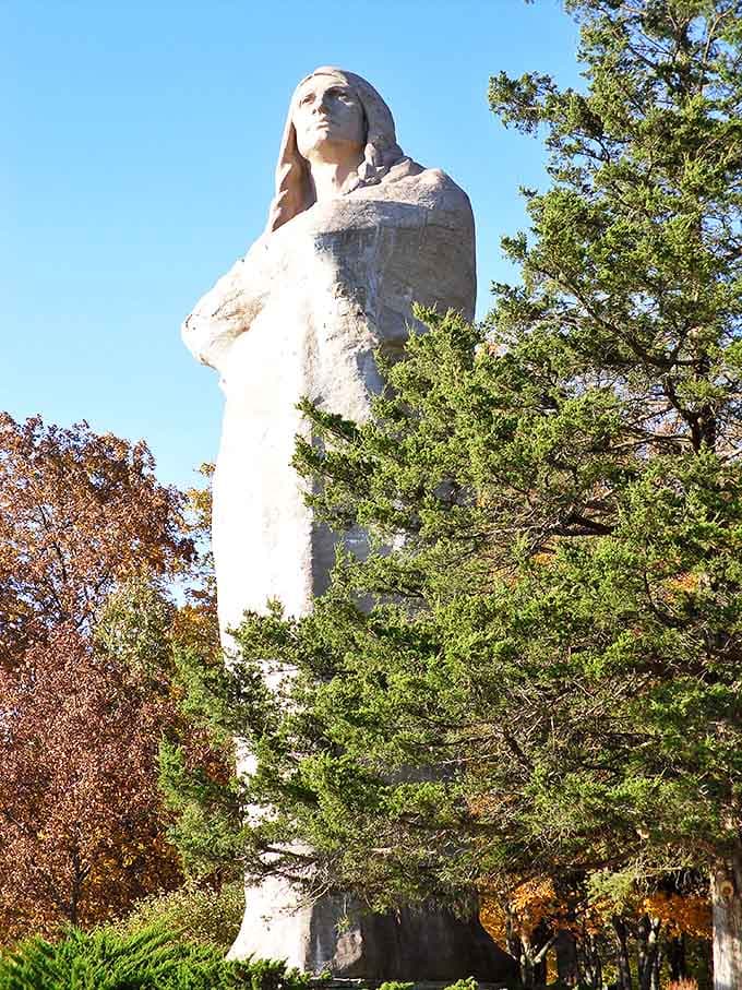 The Eternal Indian stands sentinel over the valley, 48 feet of concrete majesty that's weathered a century of Illinois seasons.