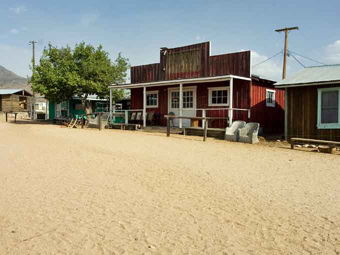 These weathered storefronts have stood guard over this dusty street longer than most of us have been alive, and they're not going anywhere.