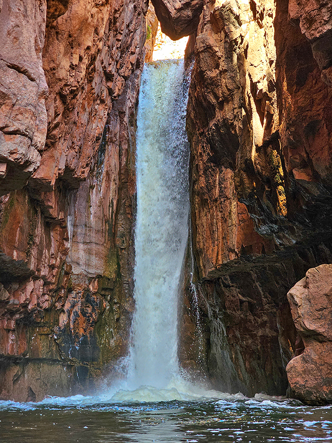 The main event: Cibecue Falls cascades 30 feet between ancient rock walls, creating a natural shower that beckons hot, dusty hikers.