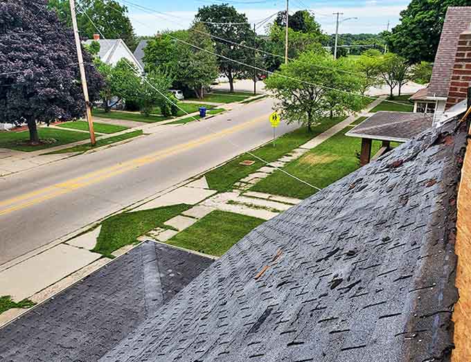 Residential rooftops and tree-lined streets stretch toward the horizon, proving small-town living doesn't mean sacrificing charm or character for convenience.