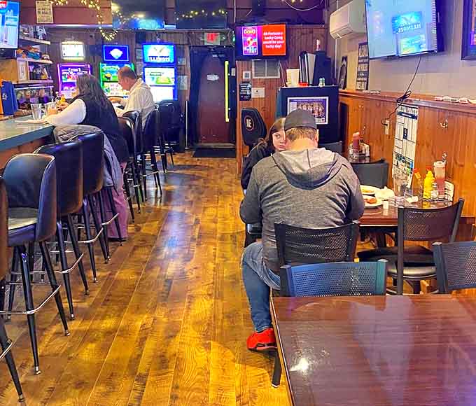 Warm wooden floors and cozy seating create that perfect small-town vibe where conversations flow as freely as the coffee.