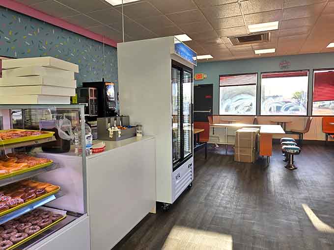 Step inside where orange booths and display cases full of carbs create the perfect no-frills breakfast headquarters.