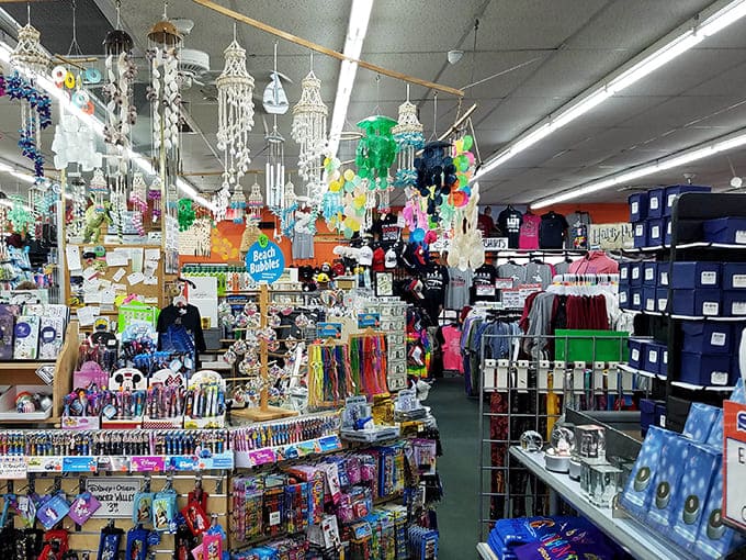 Inside Orange World, a shopper's paradise unfolds with wind chimes dangling from the ceiling and shelves packed with Florida treasures.
