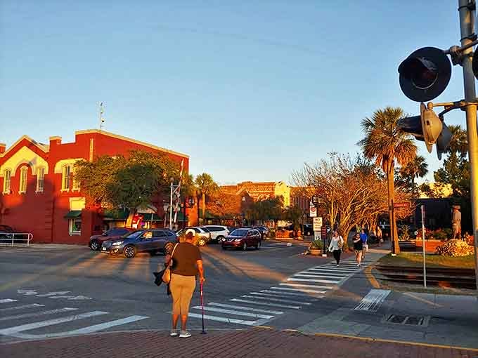 Golden hour transforms downtown into something magical, where even crossing the street feels like you're walking through a painting that came to life.