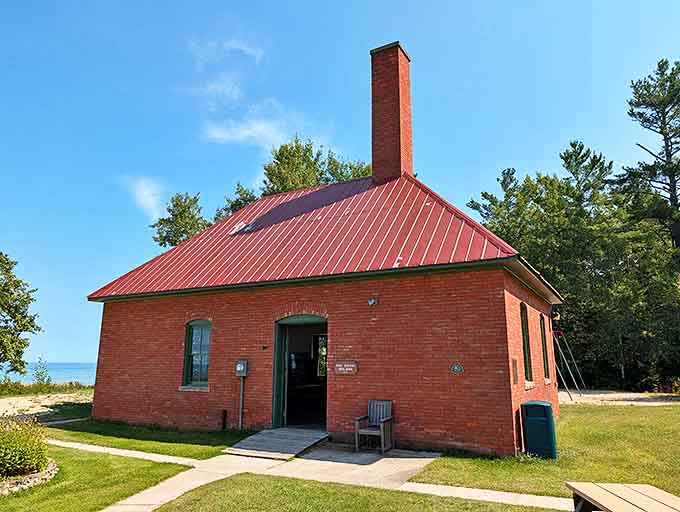 The Fog Signal Building's sturdy brick construction has weathered countless storms, housing equipment that once warned ships when visibility disappeared over Lake Huron's unpredictable waters.