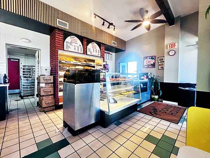 Inside Fray's, time seems to slow down. The classic bakery counter, brick accents, and no-nonsense display cases speak of decades perfecting the art of donut-making.