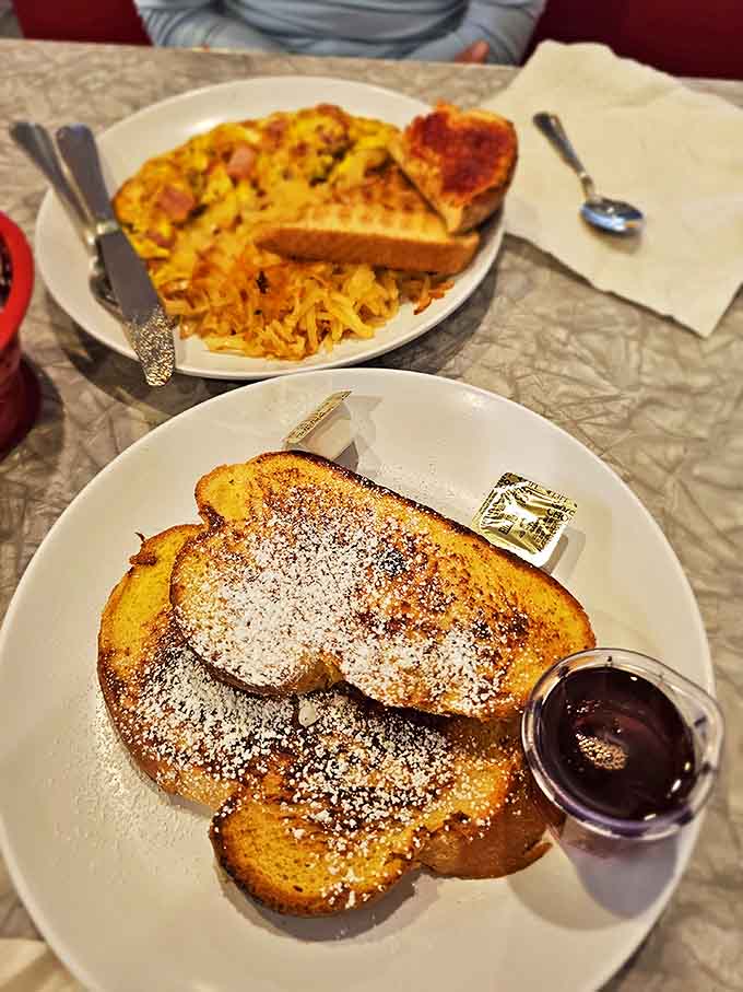 French toast that's basically dessert masquerading as breakfast &ndash; powdered sugar snowfall included, no judgment here.