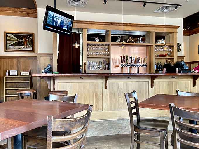 Wood tones and warm lighting create the kind of atmosphere where you actually want to stay awhile, not just eat and run.