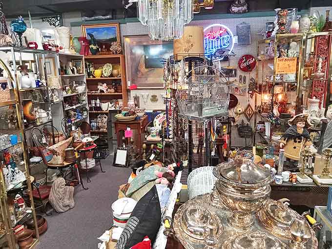 Every shelf tells a story in this organized chaos of treasures, where one person's forgotten knickknack becomes another's prized find.