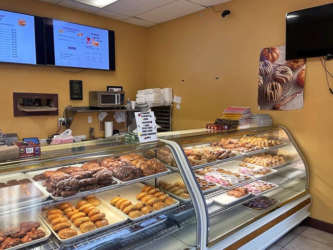 Behind this glass fortress of temptation lies a wonderland of freshly made treats that would make even the most disciplined dieter weak at the knees.