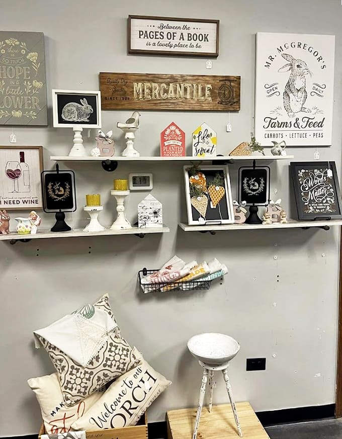 Shelves brimming with farmhouse chic signs and rabbit figurines create that "I've been collecting for years" look without the decades of dusty hunting.