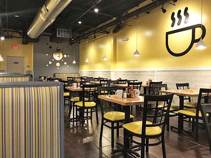 Sunny yellow walls and cozy seating create the perfect backdrop for serious pancake consumption and even more serious breakfast conversations.