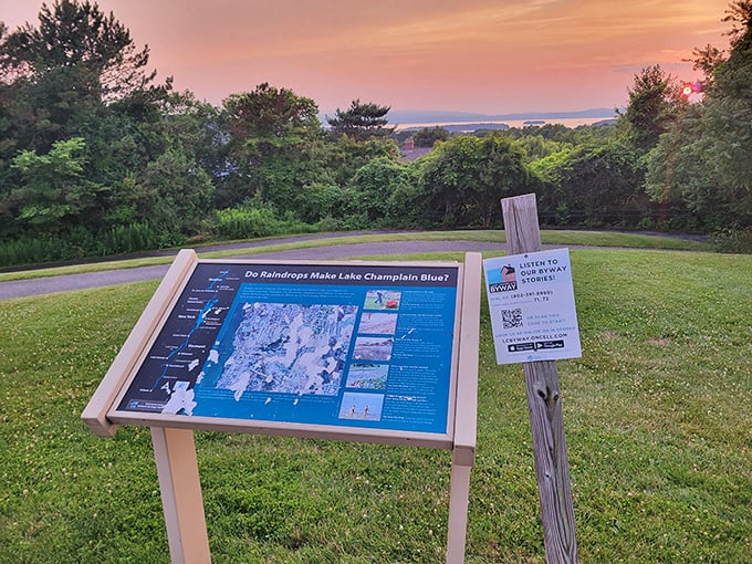 This informational plaque answers the burning question: "Do raindrops make Lake Champlain blue?" Science meets scenery in this educational stop.