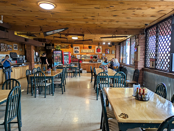 Rustic wooden charm defines the dining area, where every table promises a front-row seat to authentic roadhouse comfort and hospitality.