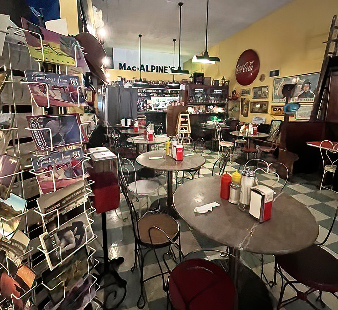 Checkered floors meet memory-filled walls in this time capsule of a diner where every corner tells a story of American nostalgia.