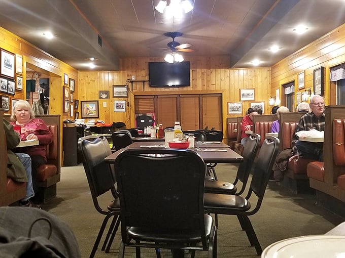 Wood-paneled walls tell silent stories of decades past, while diners settle into booths that feel like old friends welcoming you home.