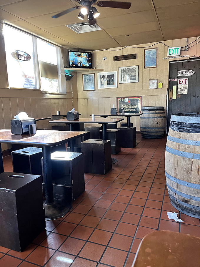 No-frills interior with character to spare. Those wooden barrel tables and tree stump seats weren't designed to be Instagram-worthy, they earned their charm honestly.