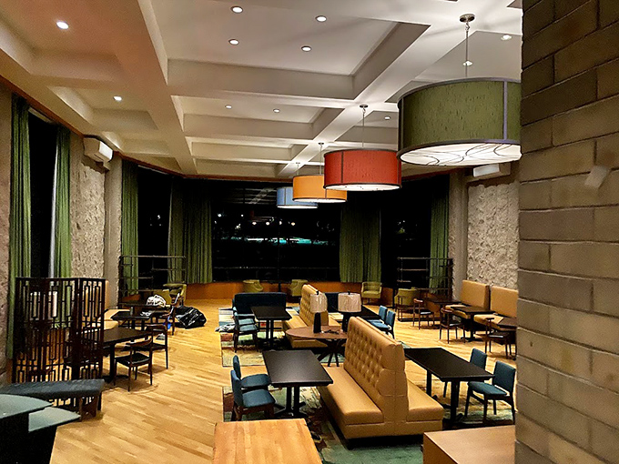 Warm pendant lighting and comfortable seating create an atmosphere that's both sophisticated and welcoming &ndash; like dining in the living room of your most stylish friend.