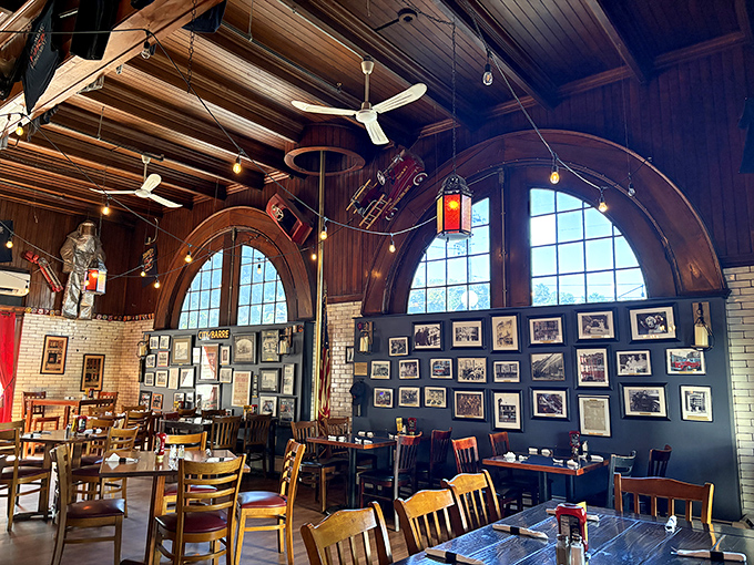 Step inside to discover soaring wooden ceilings, original brick walls, and arched windows that transform a former firehouse into a dining space brimming with character and history.