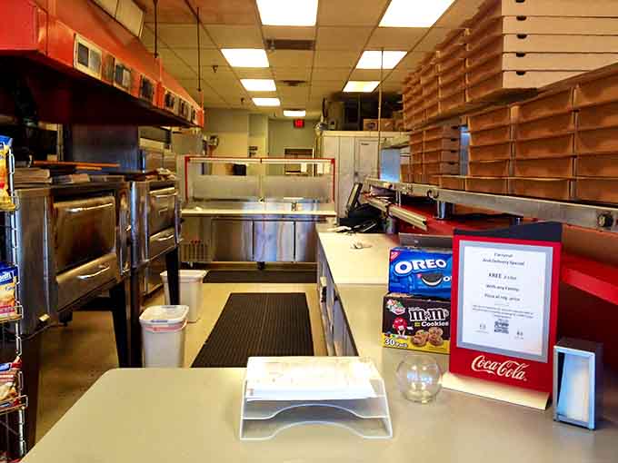 No-frills and all business, Ron's kitchen is where the magic happens – a pizza laboratory where dough dreams come true.