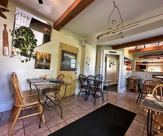 Step inside to a dining room that feels like Vermont's coziest hug &ndash; wooden accents, intimate tables, and just enough rustic charm.